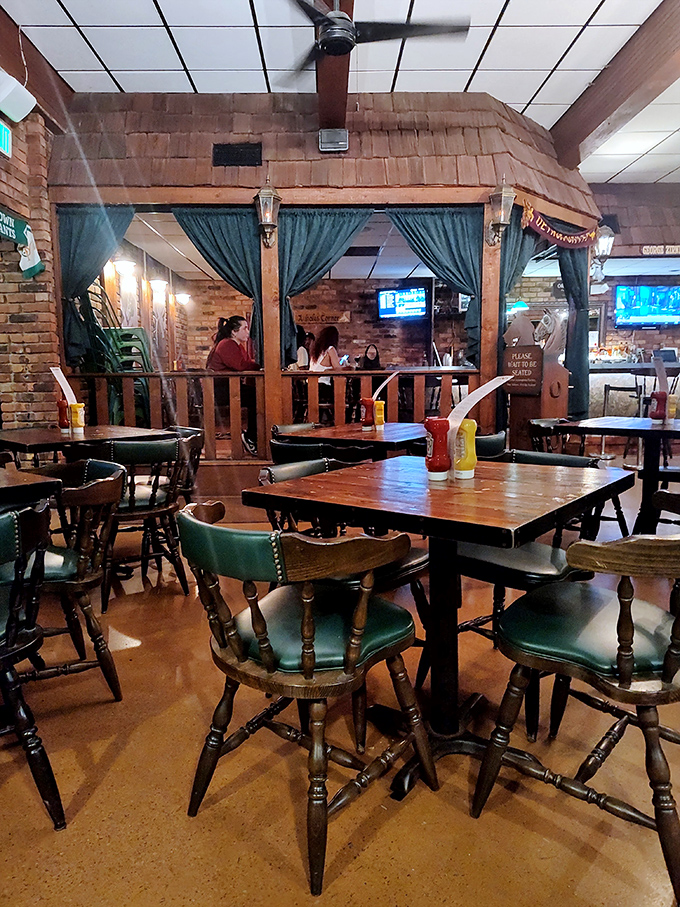 Cozy booths under wooden beams where important decisions are made &ndash; like whether to order six sliders or eight.