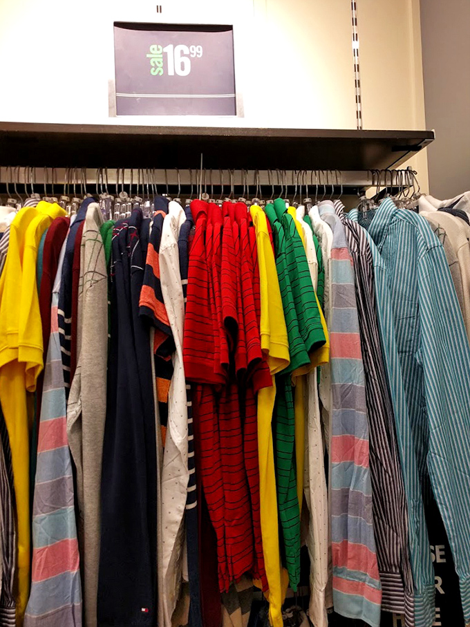 A kaleidoscope of casual shirts at $16.99—because nothing says "I'm on vacation" like bright stripes and patterns that defy description.