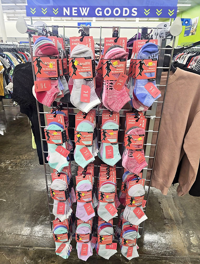 The "New Goods" section offers fresh socks and essentials—because even treasure hunters need practical items in their bounty.