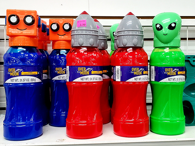 Space-themed drink bottles with robot and alien heads&mdash;because hydration should be fun, weird, and cost less than actual juice.