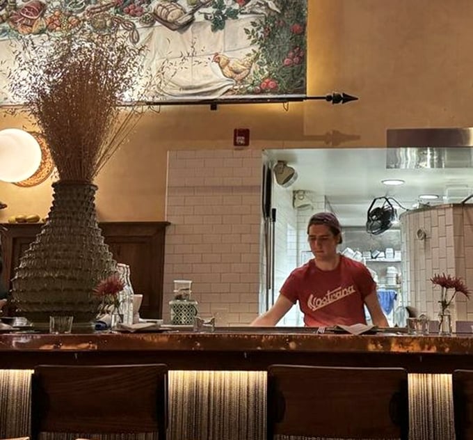 Behind every great restaurant is a dedicated team crafting culinary magic. The open kitchen design lets you witness the artistry firsthand.