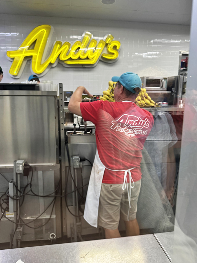 A glimpse of the banana-prepping process&mdash;where fruit meets its delicious destiny in the hands of custard craftspeople.