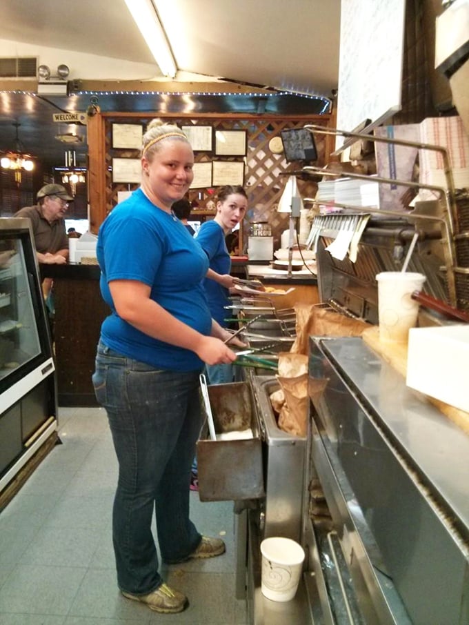 Where the magic happens. The kitchen crew works their seafood alchemy, transforming simple ingredients into plates of golden deliciousness.