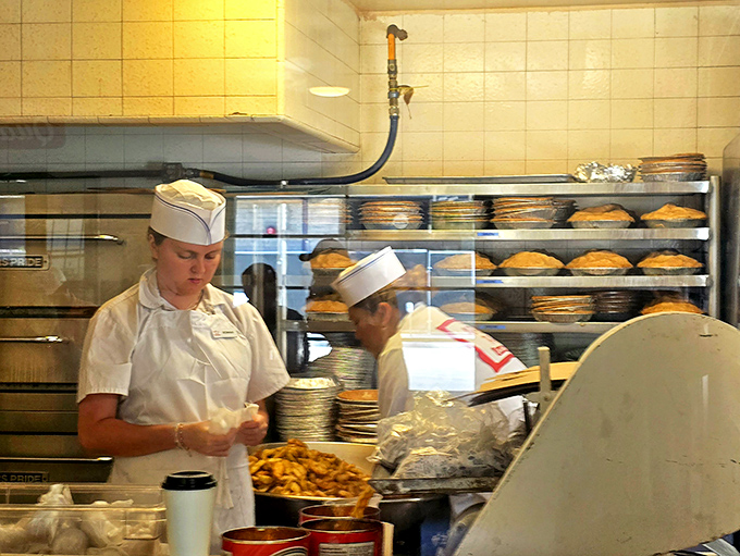 The staff in their paper hats move with the precision of people who've turned burger-making into an art form, no molecular gastronomy required.
