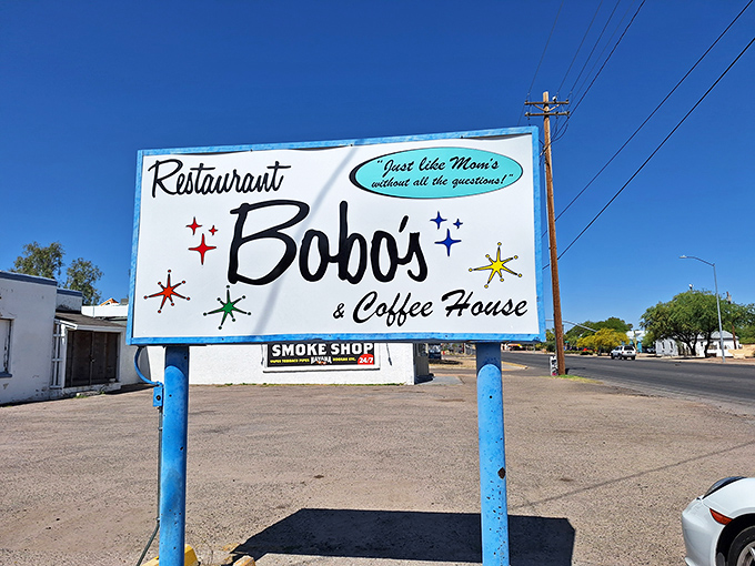 The roadside sign beckons hungry travelers with a simple promise that needs no explanation: "Just like Mom's without all the questions!"