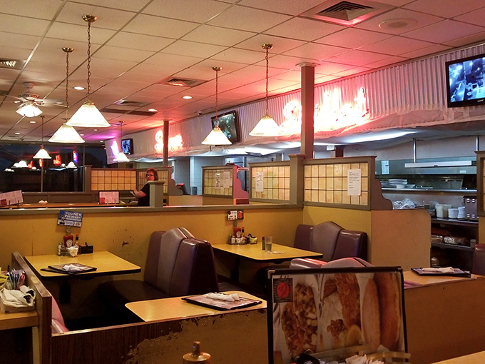Cozy booths await diners like old friends, ready to cradle you through a meal that might require loosening your belt afterward.
