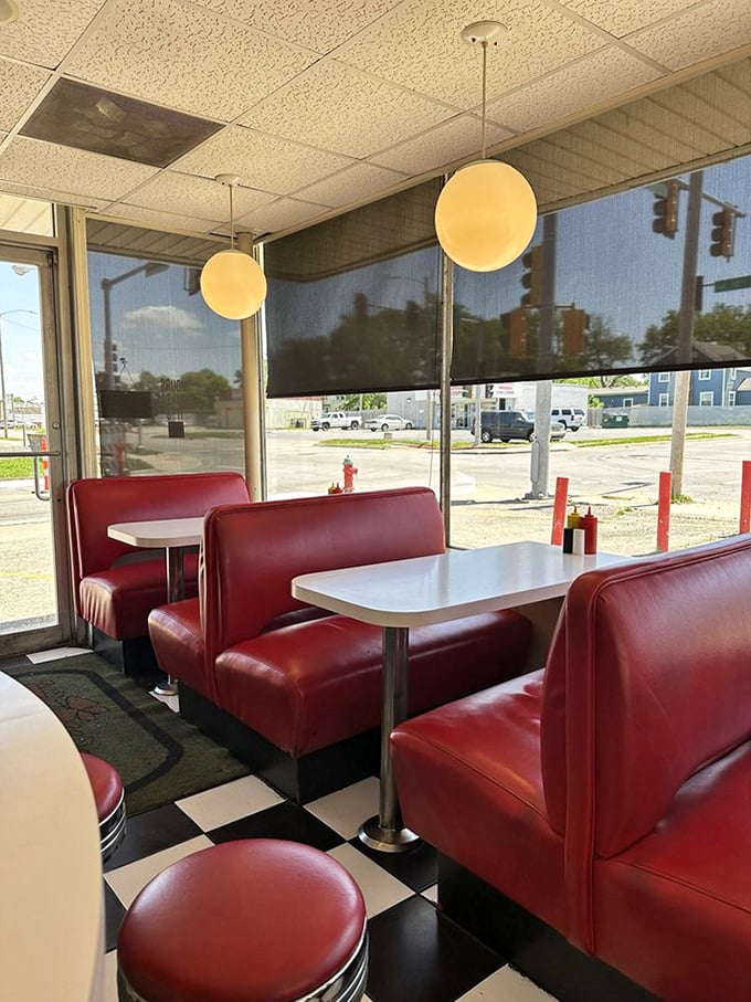Red vinyl booths bathed in natural light&mdash;the perfect setting for making memories over milkshakes and burgers while watching the world go by outside.