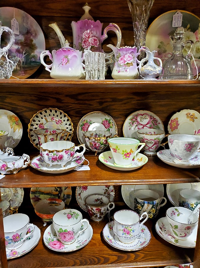 Delicate teacups and saucers arranged like a Victorian dream. Downton Abbey has nothing on this porcelain parade of floral elegance.
