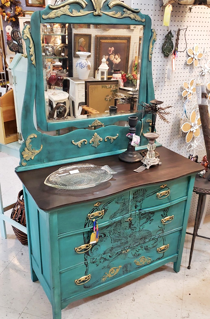 A teal dresser that's lived many lives before finding its way here&mdash;furniture with more personality and stories than most dinner guests.