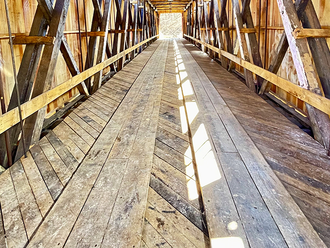 The worn wooden planks tell tales of countless crossings—each board a chapter in an ongoing story of American transportation evolution.