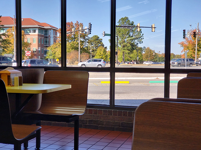 Window seats offer prime people-watching with your meal. The view of Russellville adds local flavor to every bite of your Whatta-Burger.