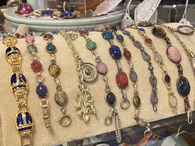 Vintage bracelets lined up like soldiers, each gemstone and setting whispering tales of cocktail parties and white-gloved special occasions.