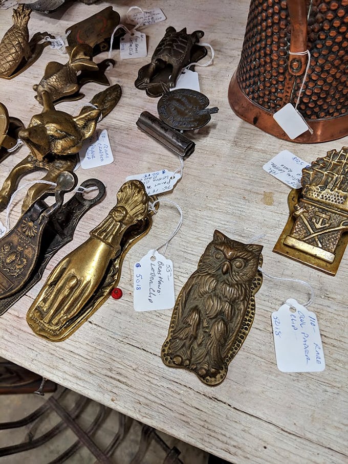 Brass door knockers and vintage hardware add character to homes, because apparently people once knocked with style.