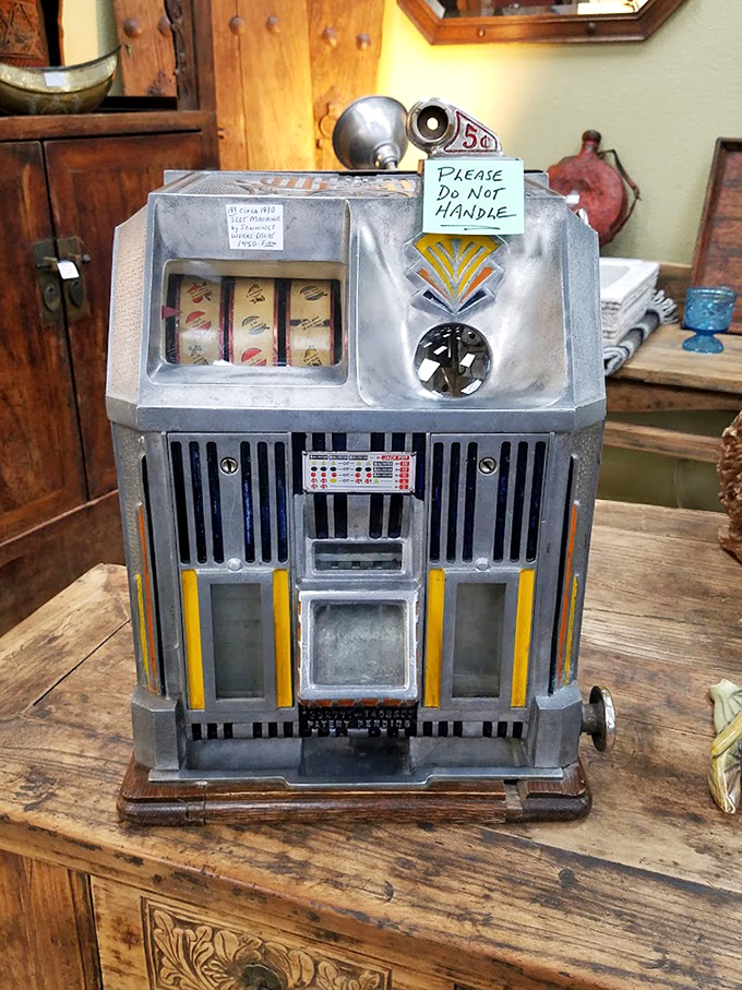 "Please Do Not Handle" – words that make this vintage slot machine even more tempting. A piece of Vegas history that's hit the jackpot in preservation.