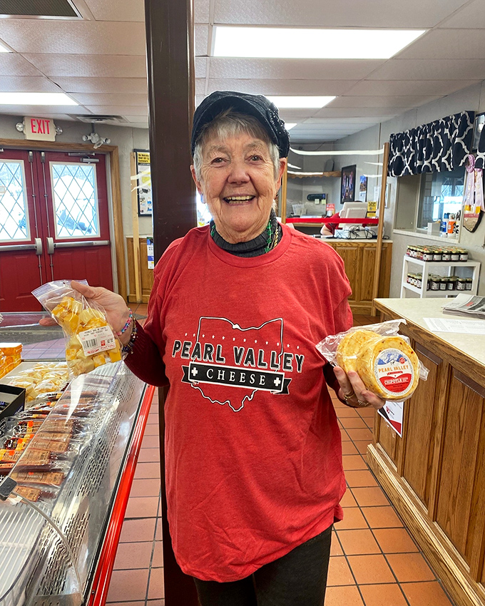 The cheese ambassador herself, proudly displaying the fruits of Pearl Valley labor. That smile says, "Yes, I know how lucky I am to work here."