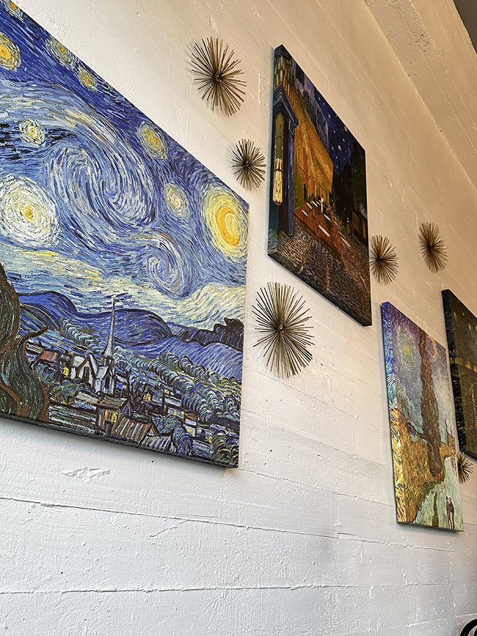 Van Gogh's Starry Night watches over diners, proving that feasts for the stomach and feasts for the eyes belong together.