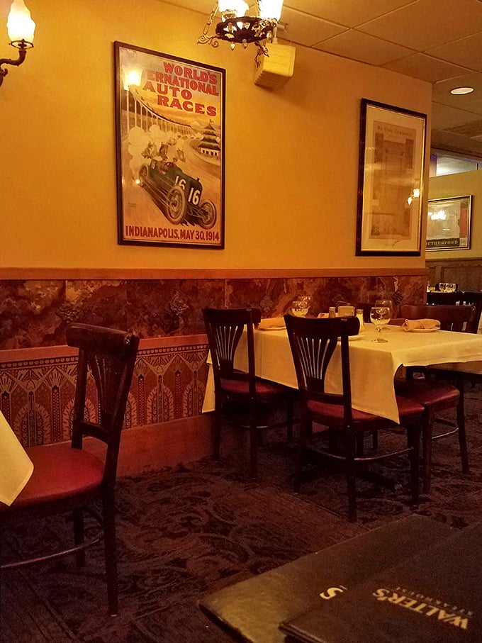 Vintage racing posters transport you to another era, when both cars and steaks were unapologetically robust and built for performance.