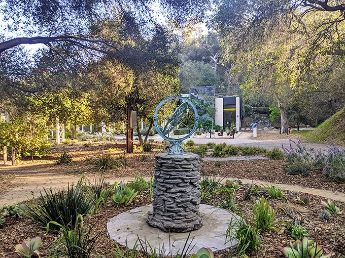 This sundial sculpture reminds us that gardens mark time differently than humans do. Here, seasons are the only clock that matters.