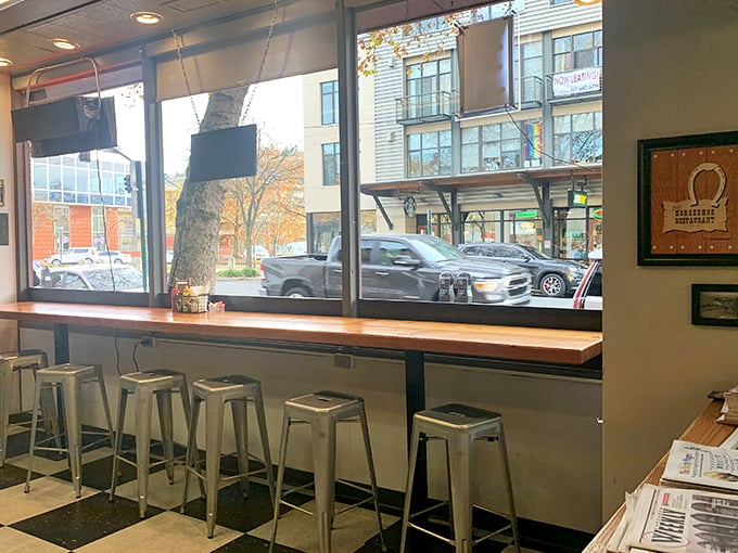Window counter seating: perfect for solo diners, people-watching, and pretending you're in an Edward Hopper painting.