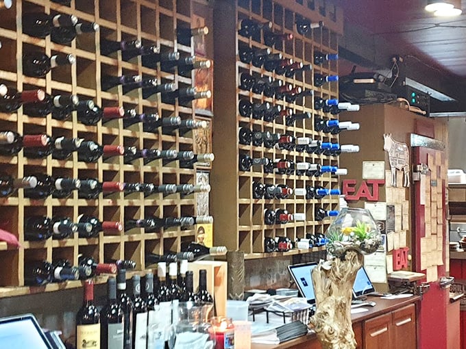 That wine wall stands at attention like bottles reporting for delicious duty with your ribeye.