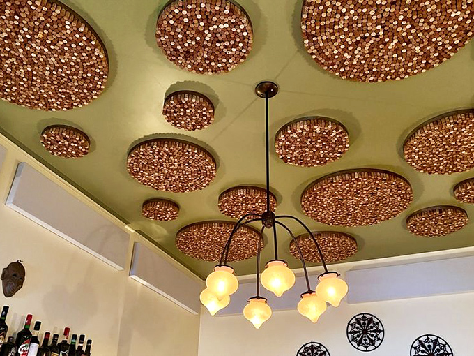 Those wine cork ceiling medallions prove that great design happens when creativity meets a really good vintage.
