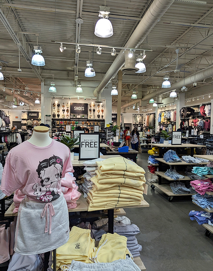 Retail therapy in progress: racks of pastel promise where "Buy One Get One" signs work better than any antidepressant.