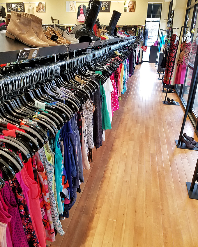 Tops arranged by color creating a shopping experience that's oddly satisfying, like organizing your closet but way more fun.