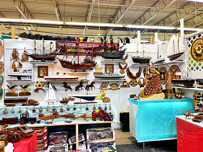 A wall of miniature ships and wooden crafts showcasing the meticulous handiwork of Michigan artisans.