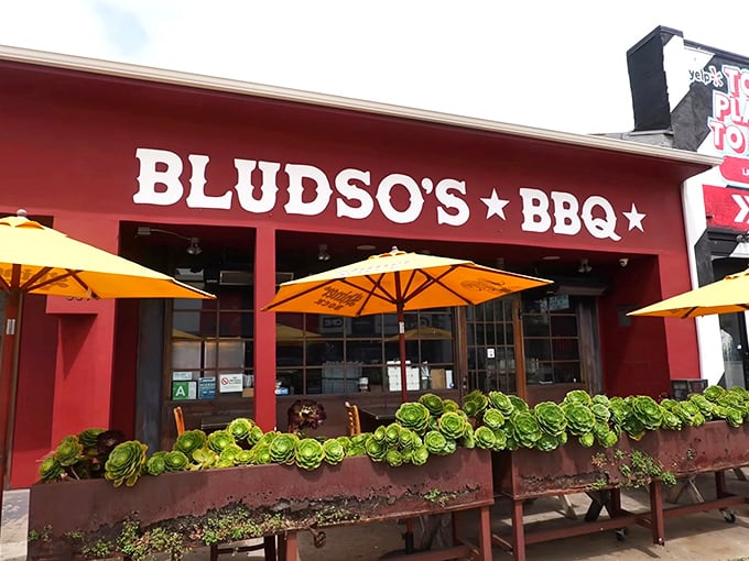 Bludso's bold red exterior and succulent planters create the perfect California setting for authentic Texas-style BBQ.