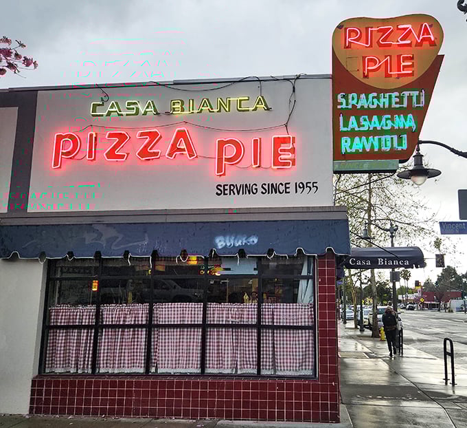 Casa Bianca's iconic neon sign has lit up Eagle Rock nights since 1955, a beacon of old-school pizza perfection.