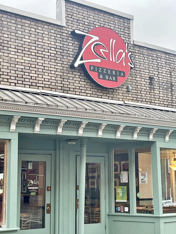 Behind that distinctive green storefront, pizza innovation meets tradition in the most delicious possible way. 