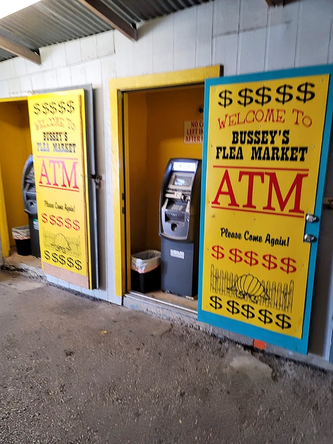 ATM machines dressed in sunshine yellow, because even at a flea market, cash remains king. The dollar signs aren't subtle, but they are honest.