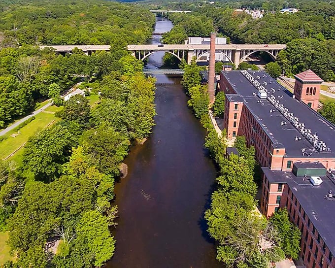 This aerial view reveals Lincoln's perfect balance&mdash;historic mill buildings nestled alongside the Blackstone River and abundant greenspace.