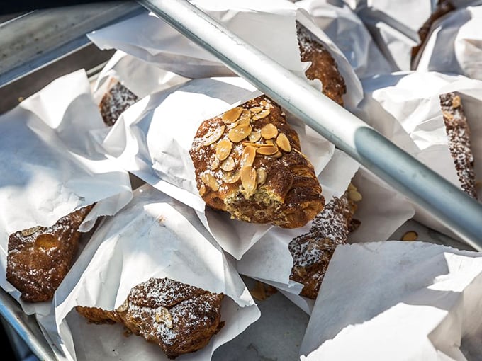 Almond croissants dusted with powdered sugar like the first snow of winter. Butter and almonds having their best day ever.