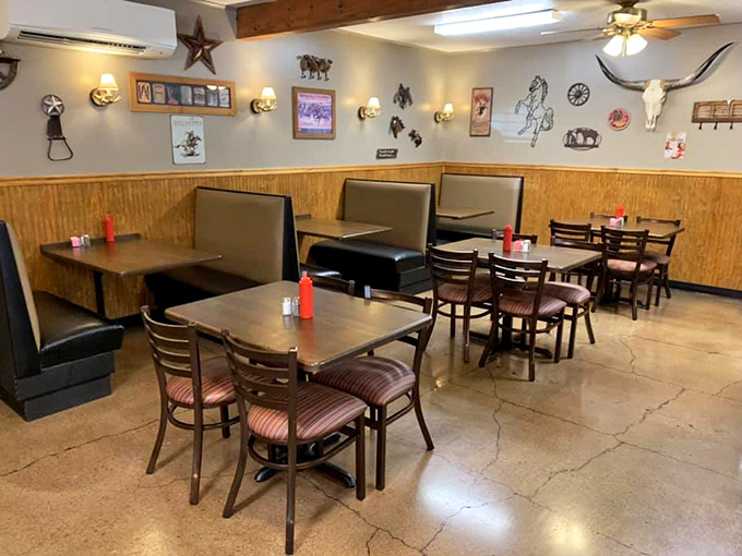 Longhorn skulls and cowboy silhouettes watch over diners, silently approving your decision to order both chicken AND catfish.