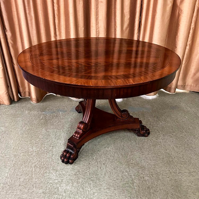 This isn't just a table&mdash;it's a masterpiece of woodworking with paw feet that would make any antiques roadshow appraiser swoon.