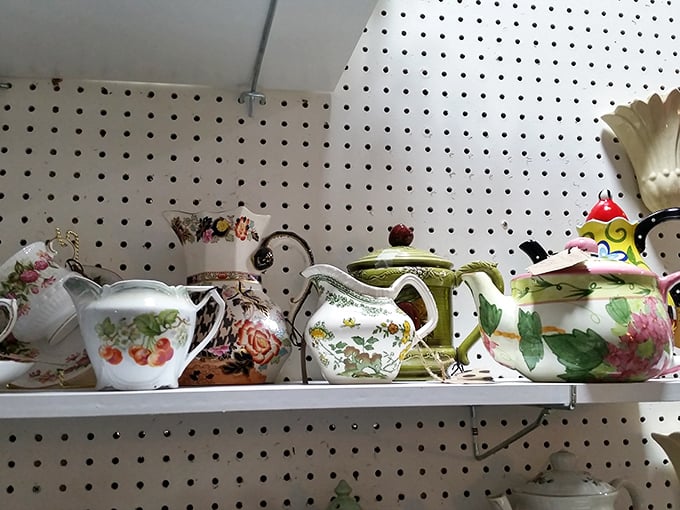 A parade of floral teapots and creamers, each one ready to turn your ordinary afternoon into a scene from "The Crown."