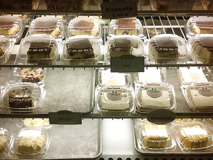 The dessert case: where willpower goes to die and "I'll just have a bite" becomes the lie we tell ourselves.