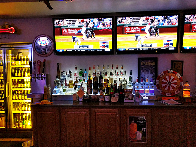 A bar stocked for serious sports watching. Those multiple screens ensure you'll never miss a Packers touchdown, no matter where you're sitting.