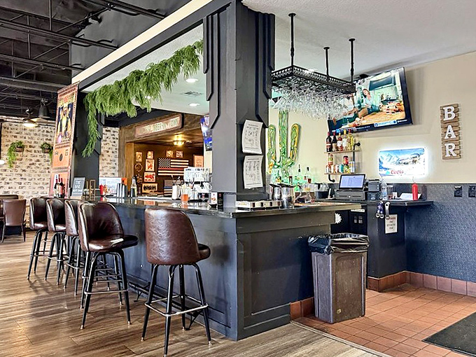 The bar area strikes that perfect balance between "neighborhood watering hole" and "place where the cocktails won't give you regrets tomorrow."