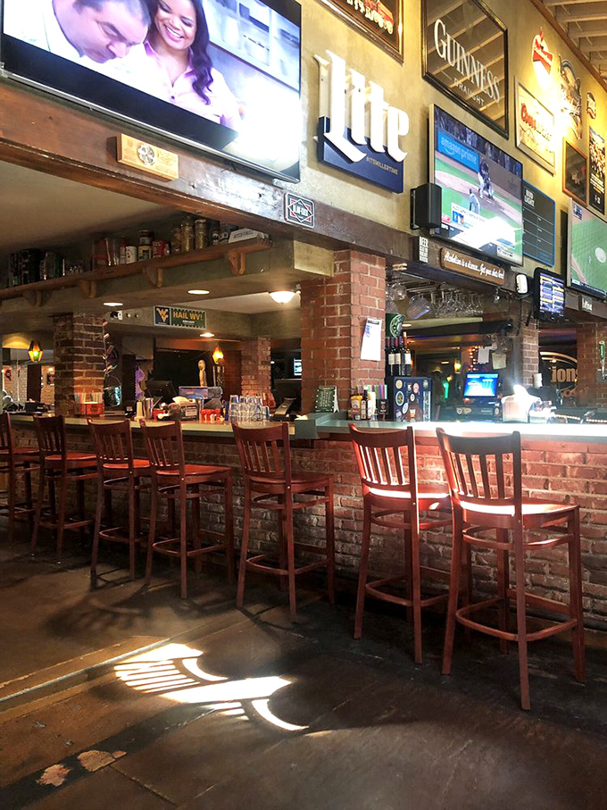 The bar beckons with the promise of cold drinks, good conversation, and the possibility of making new friends over shared appetizers.