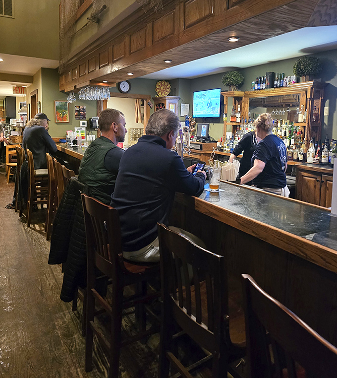 The bar—where locals gather to debate important matters like whether today's fish and chips were even better than yesterday's.