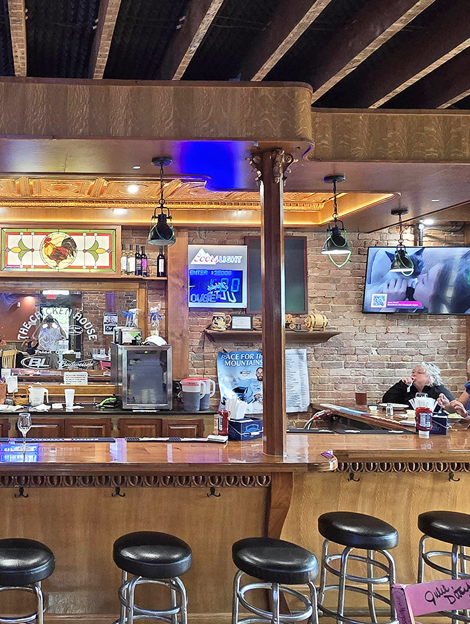 Where beer meets bird. The bar's warm wood tones and exposed brick create the perfect backdrop for post-chicken conversations and cold brews.