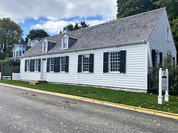 The Biddle House stands as a perfectly preserved example of early 19th-century architecture, its whitewashed clapboard and symmetrical windows telling stories of island history.