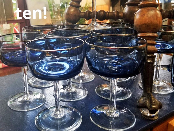 Cobalt blue goblets that would make even your boxed wine taste like it came from a royal vineyard. The "ten!" overlay suggests someone's excitement is contagious.