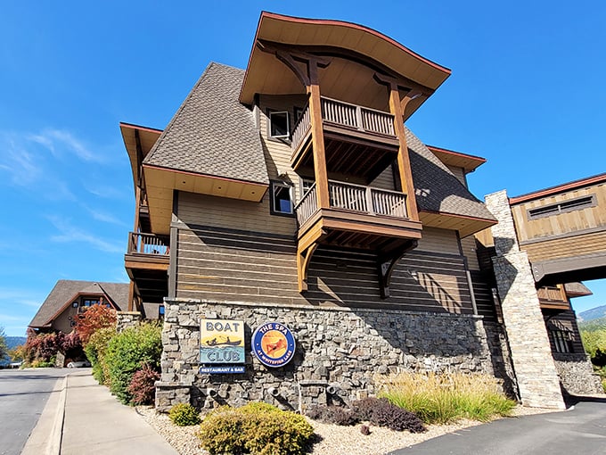 The Boat Club's dramatic architecture makes a bold statement against the Montana sky, with sweeping lines that echo the surrounding mountain peaks.