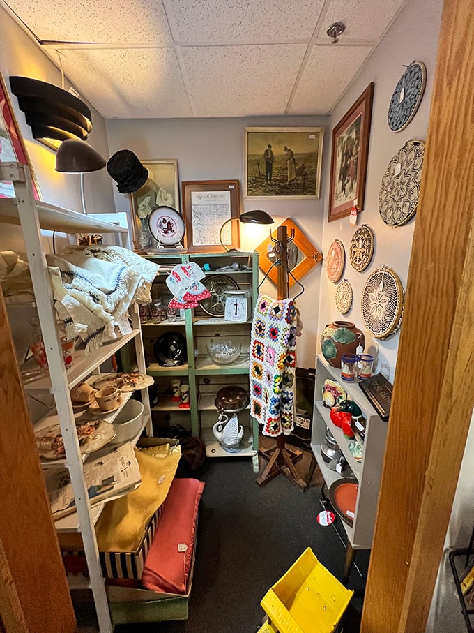 Every booth is someone's carefully curated corner of the past, this one mixing practical kitchenware with whimsical decorative touches.