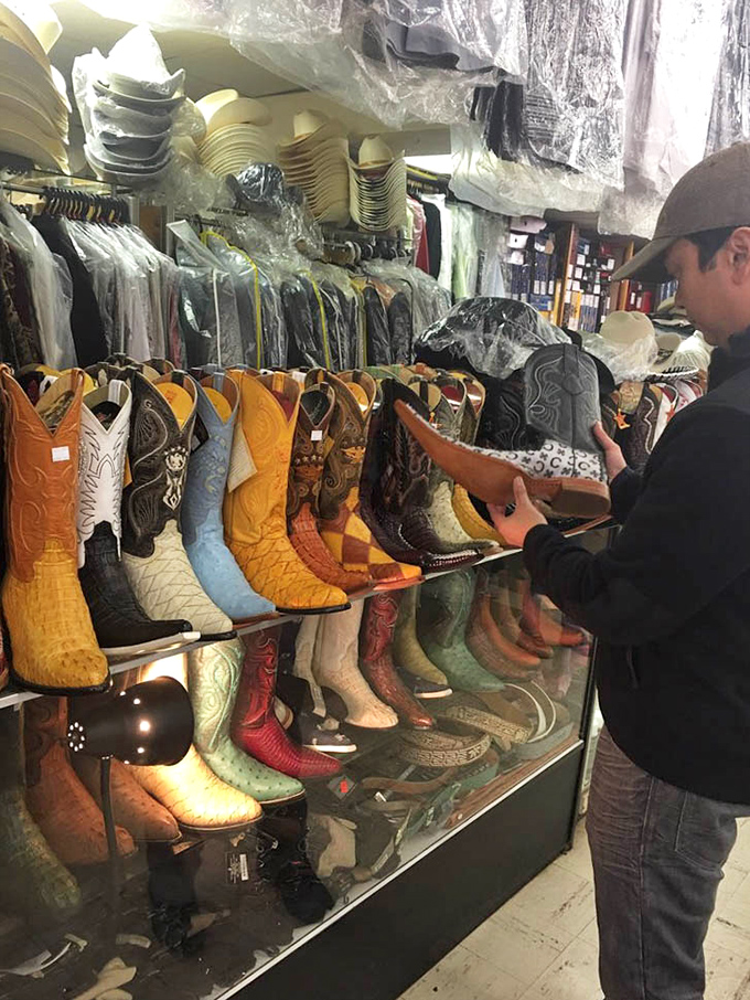 Cowboy boots in every imaginable color and pattern stand at attention, waiting for their next rodeo or simply a night on the town.