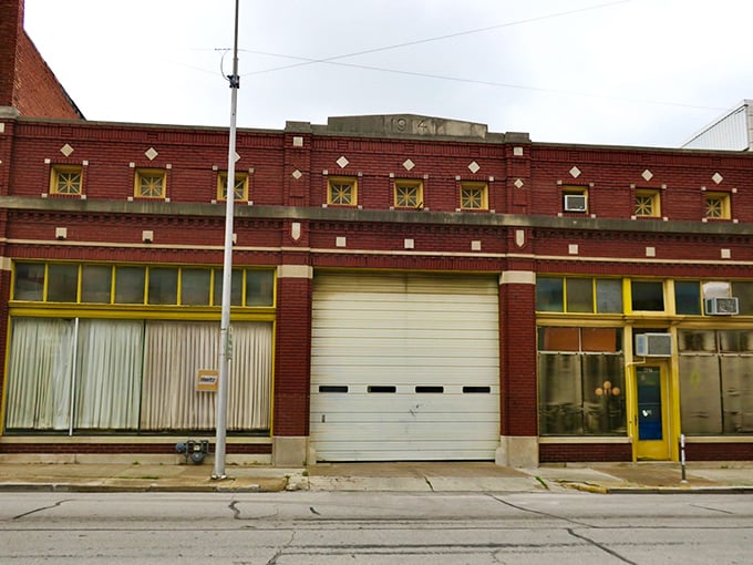 This classic brick building with distinctive yellow windows waits patiently for its next incarnation. In the real estate equivalent of a makeover show, it's in the "before" stage.