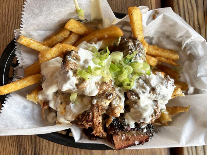 Brisket queso fries&mdash;because sometimes you need your comfort foods to join forces. This magnificent mess is worth every napkin you'll go through.